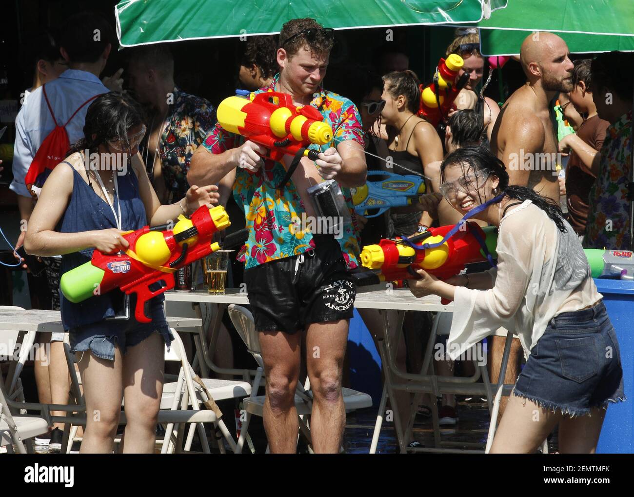 Tourists seen using water guns during the festival. The Songkran ...
