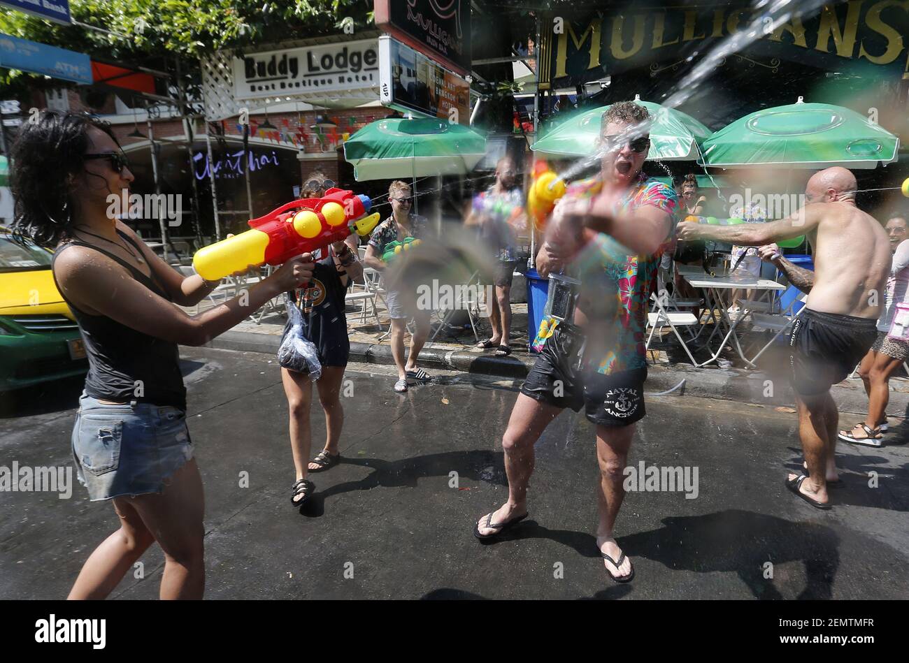 Tourists seen using water guns during the festival. The Songkran ...