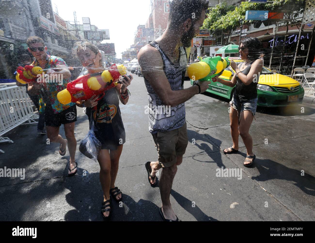 Tourists seen using water guns during the festival. The Songkran ...