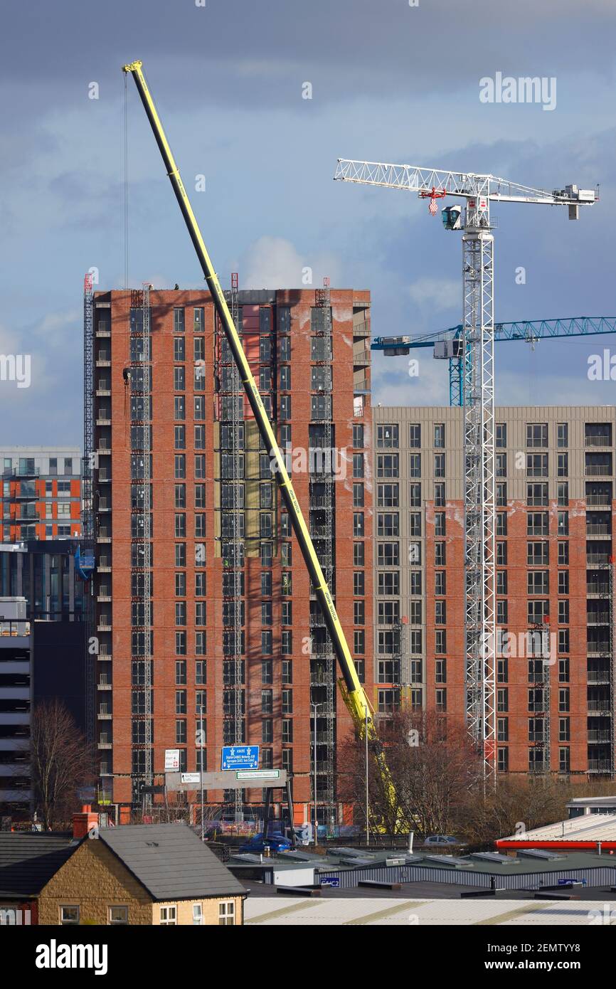 A mobile crane set up on a construction site in Leeds to remove the ...
