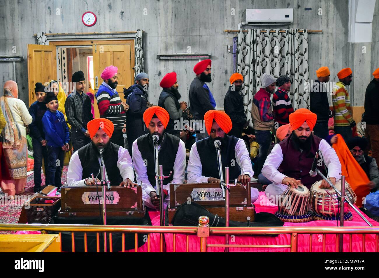 Sikh devotees seen singing kirtans (religious hymns) inside the ...