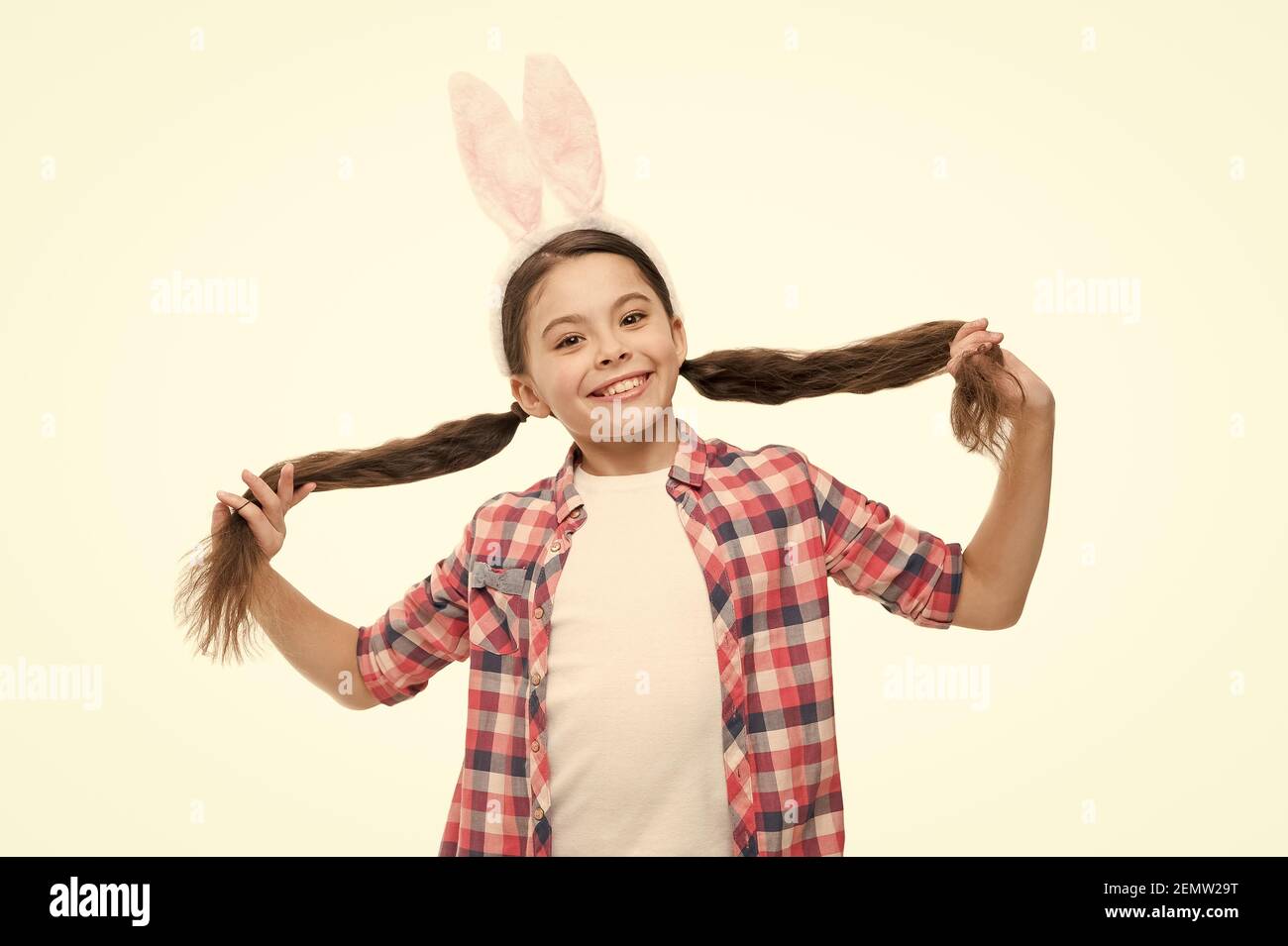 happy girl wear bunny ears. cheerful little kid have funny look. happy ...