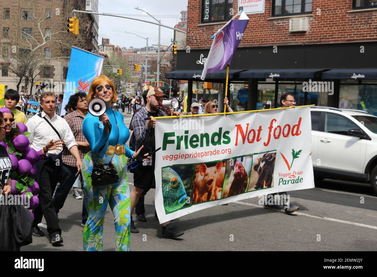 People seen holding a banner to encourage others to be vegan during the ...