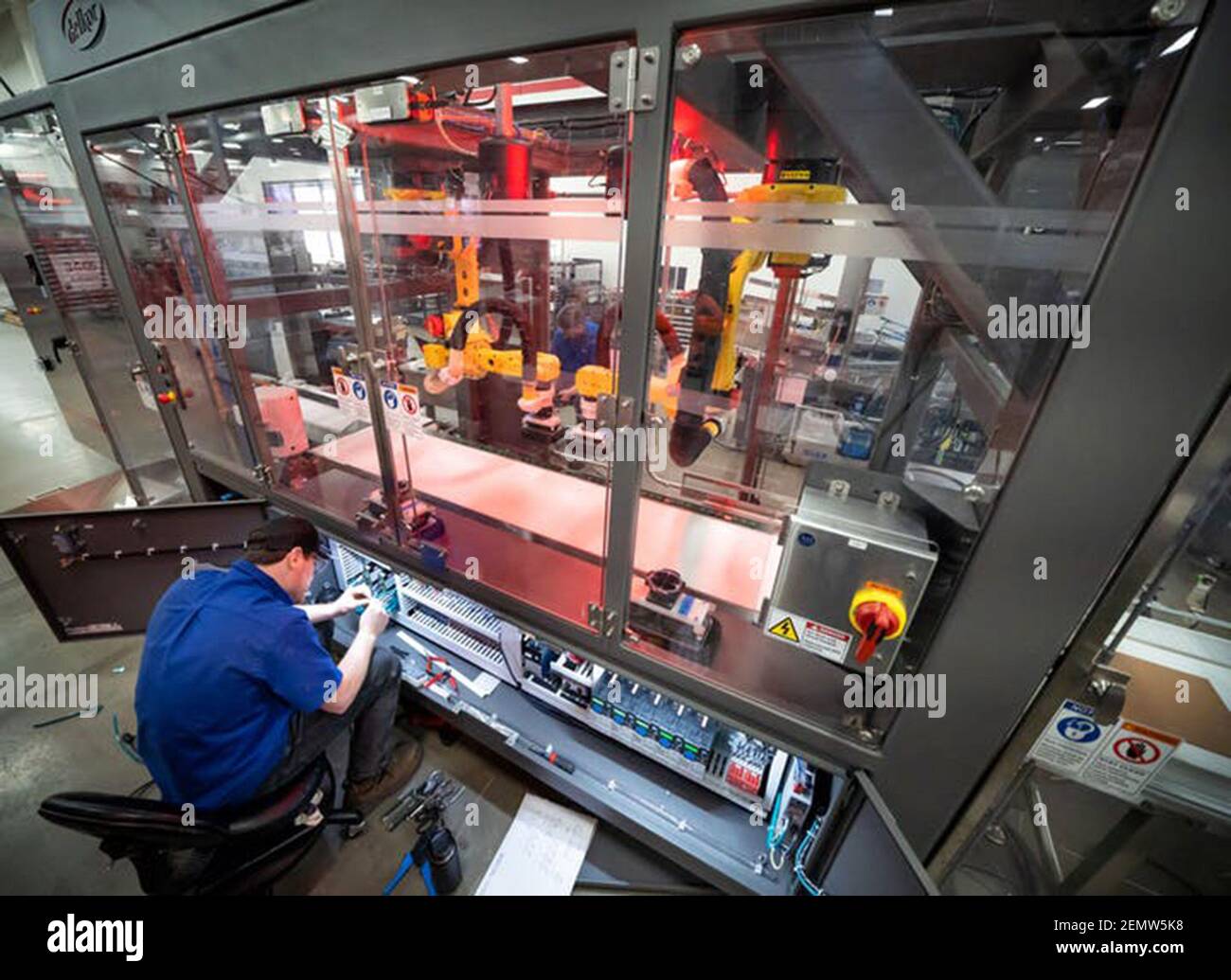 Dylon Eisele worked on the control panel of a Delkor case loader ...