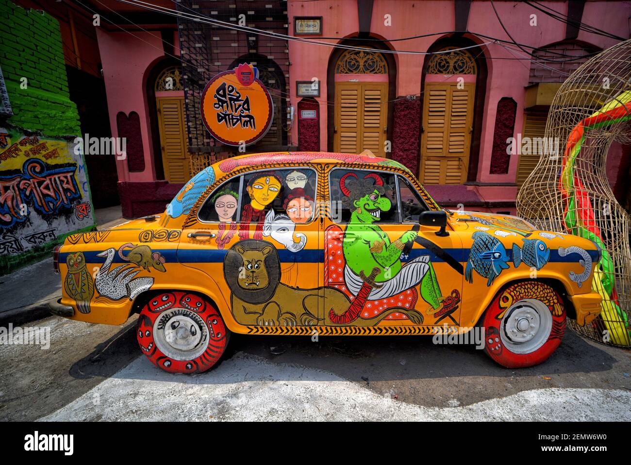 Beautiful graffiti seen on an old Taxi during the occasion. Artists ...