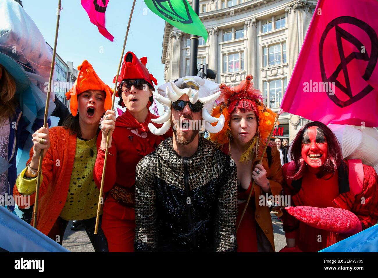 Environmental activists wearing fancy dress costumes are seen shouting ...