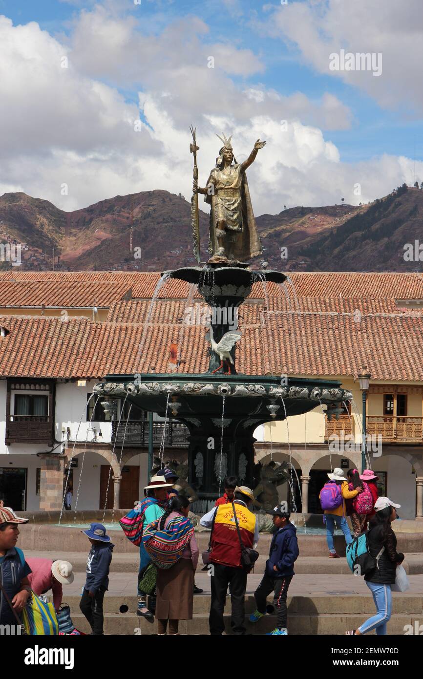 A fountain with a statue of the Inca King Pachacutec in the main square ...