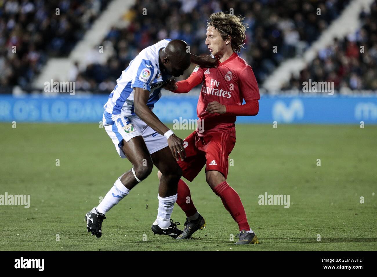 CD Leganes's Allan Romeo Nyom and Real Madrid's Luka Modric during La Liga match between CD ...