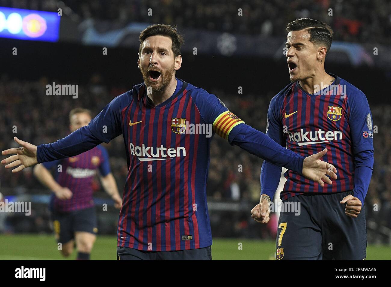 Lionel Messi of FC Barcelona celebrates his goal with Phillippe ...