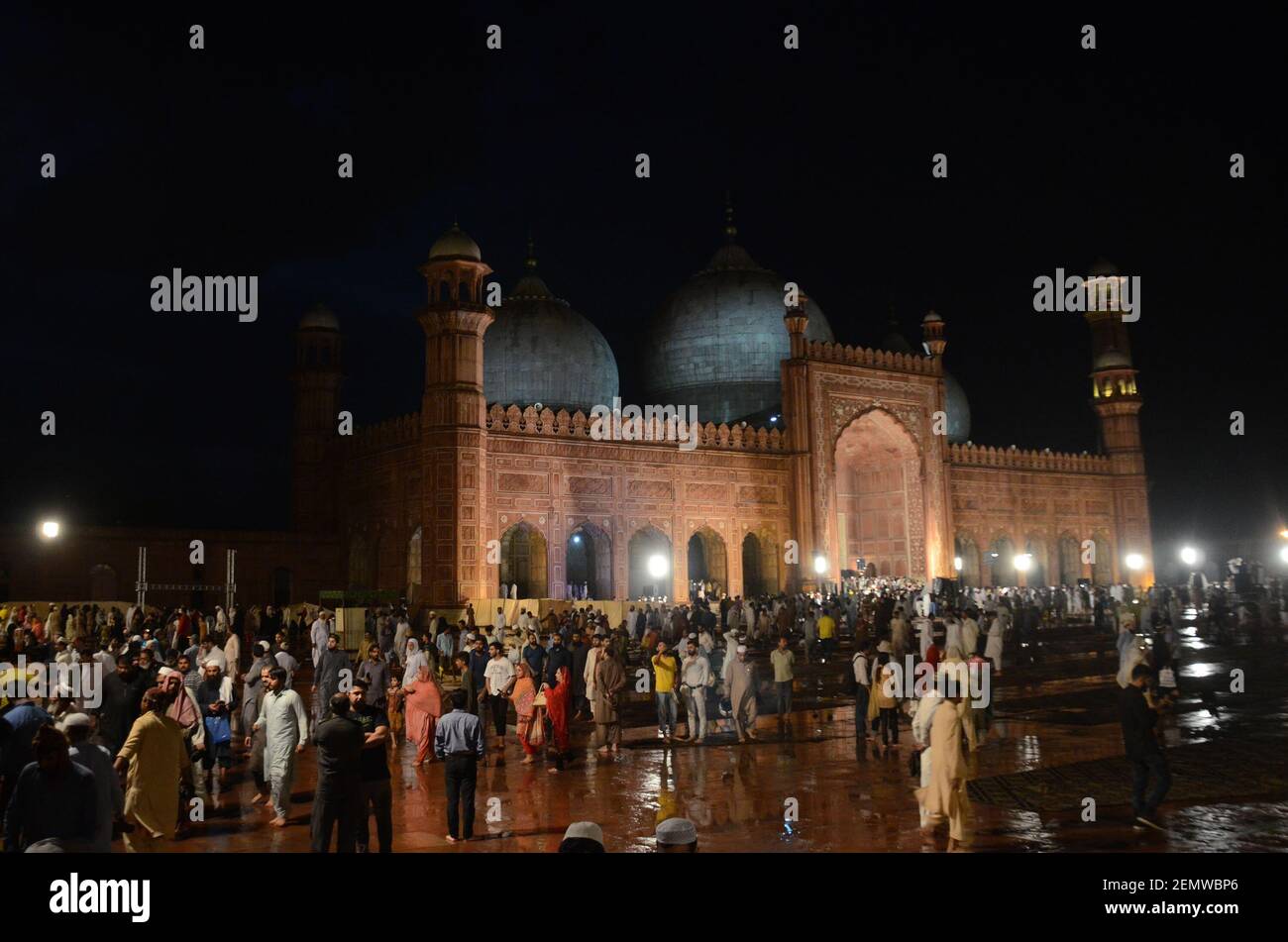 Thousands of Pakistani People arrive to attend the Maghrib prayer ...