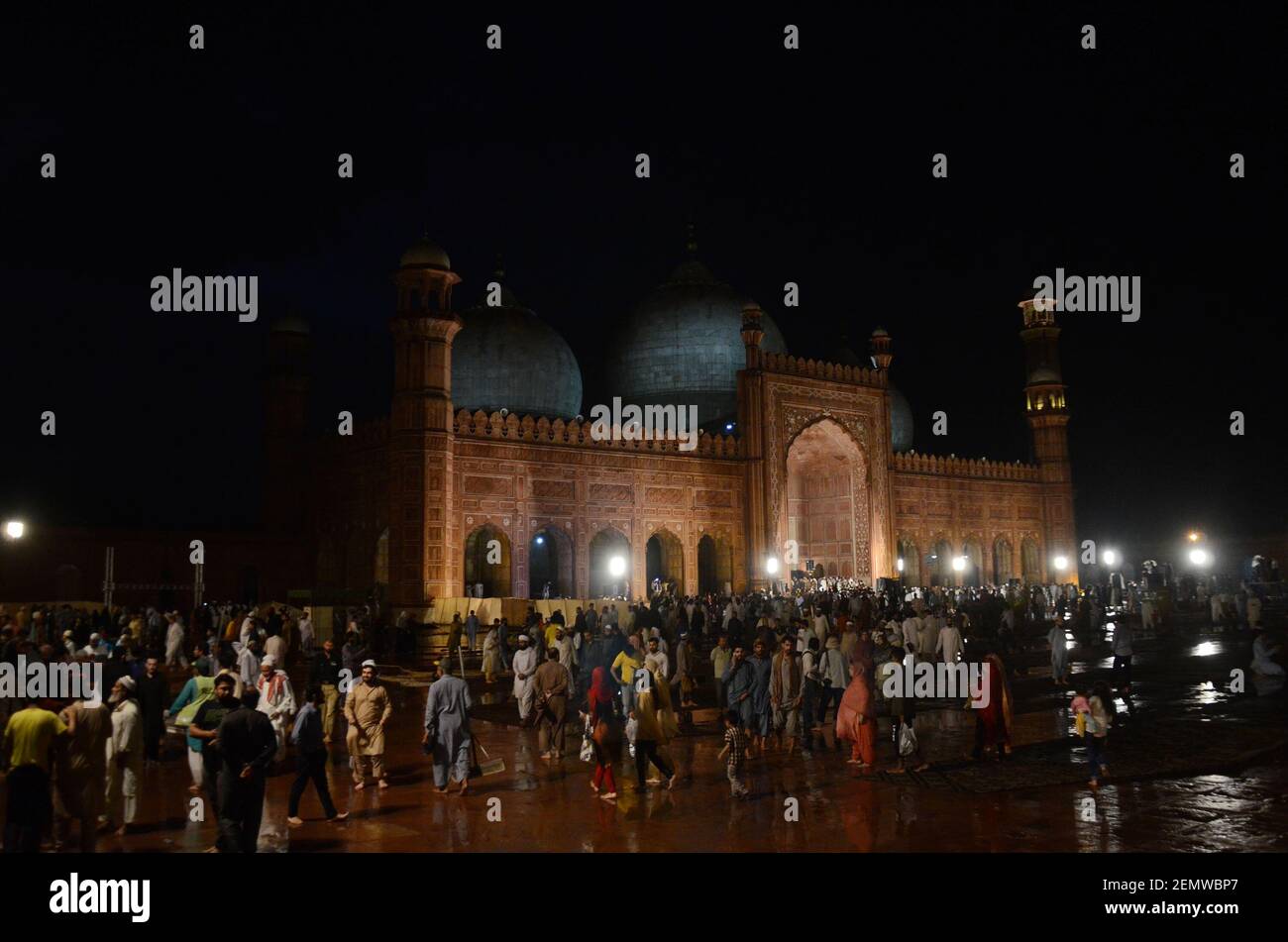 Thousands of Pakistani People arrive to attend the Maghrib prayer ...