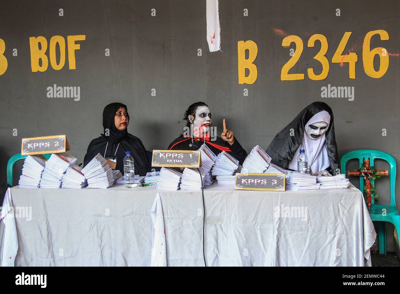 Electoral officers are seen wearing outfits with horror themes at the ...