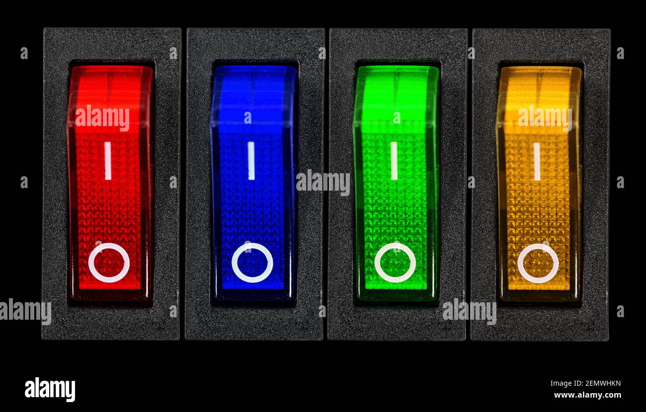 Red, blue, green and yellow power switches at OF position, isolated on ...