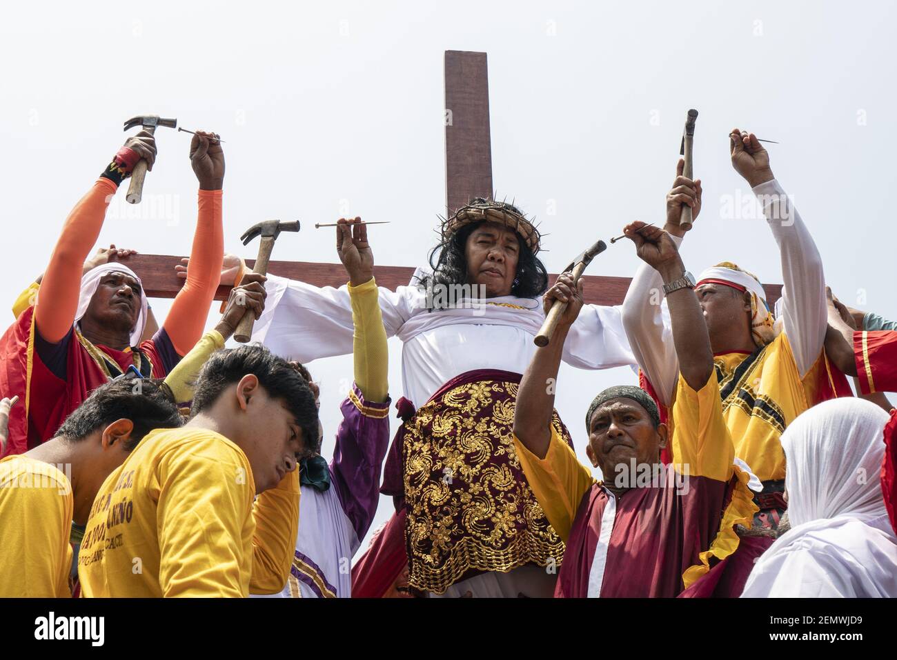 Tomas Vincent Mondragon, a male devotee, is nailed to a wooden cross ...