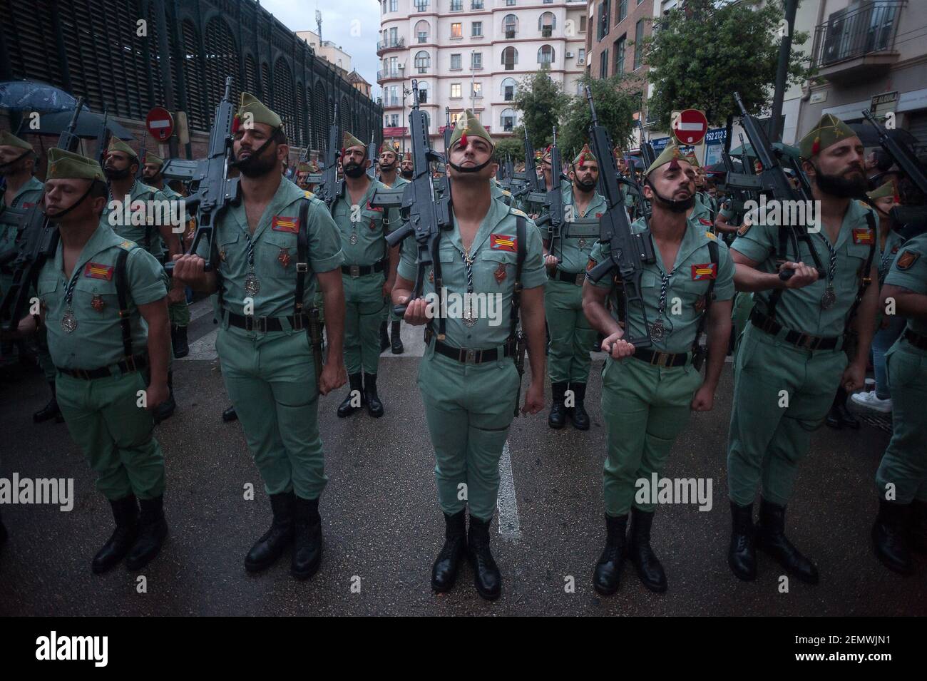 Spanish legionnaires are seen taking part during the procession of ...