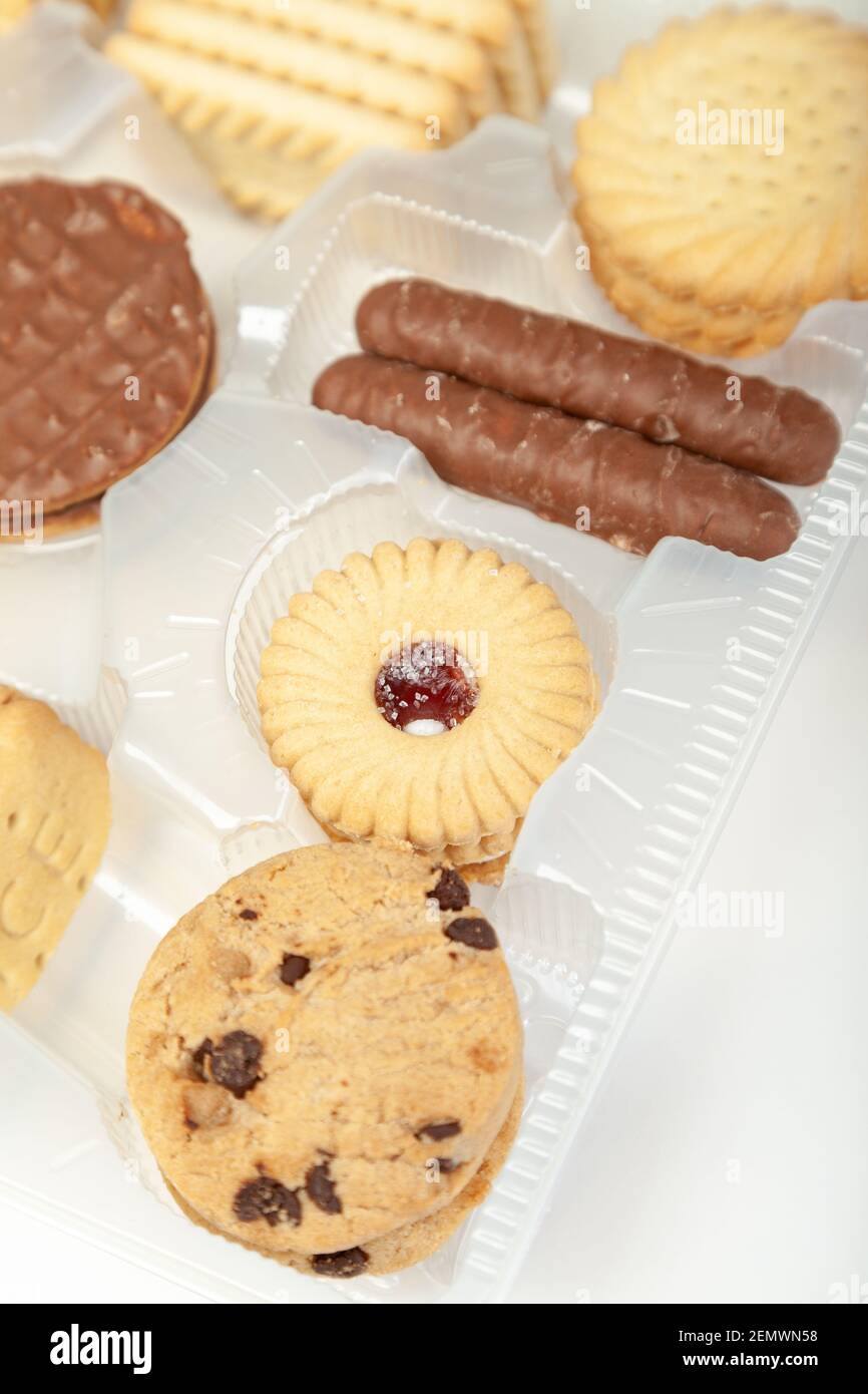 An assortment of biscuits in their plastic tray shot from above Stock ...