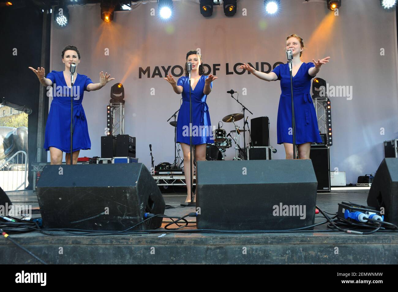 Rooftop trio, live band are seen Performing on stage during the feast ...