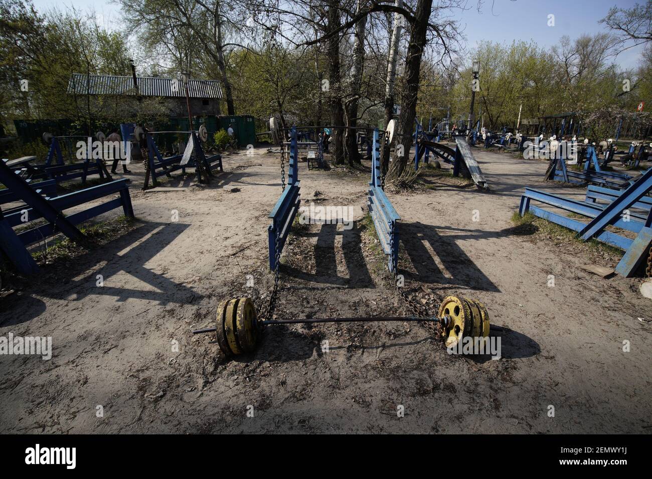 Barbells made with car breaks and tank wheels are seen at the Kachalka ...