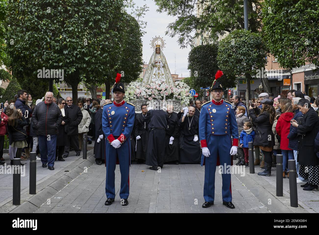 Two policeman with their great gala costumes seen escorting the image ...
