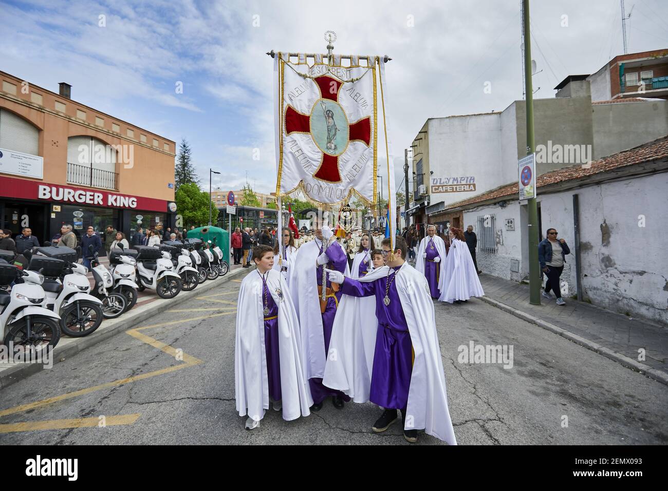 Believers seen carrying a flag during the traditional procession of ...