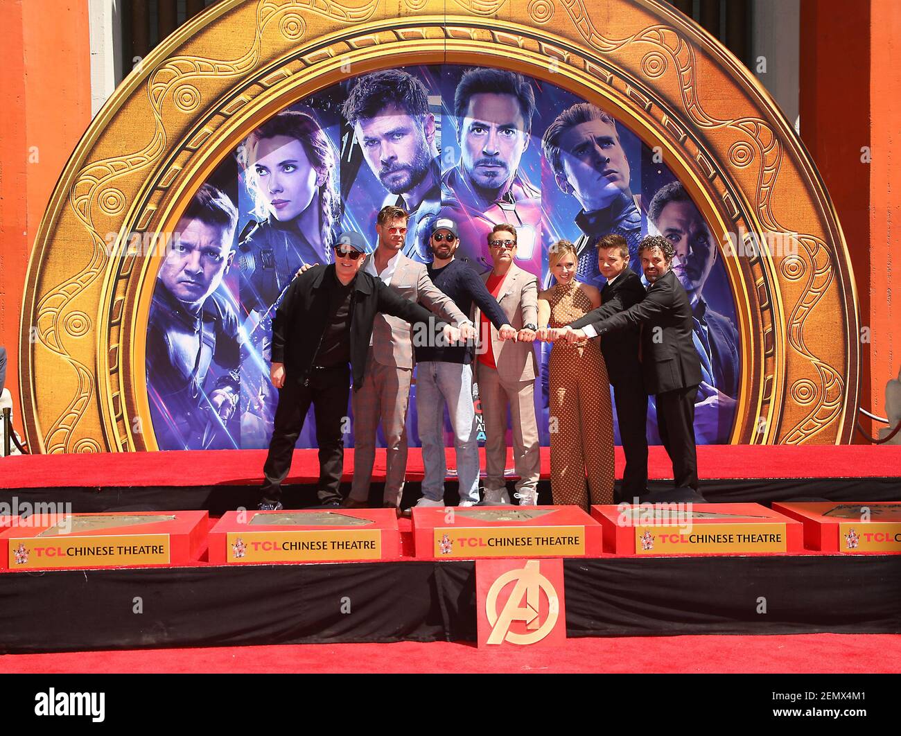(L-R) Marvel Studios President Kevin Feige, Chris Hemsworth, Chris ...