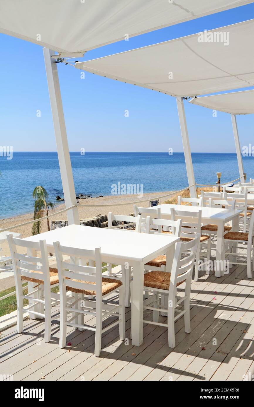 Typical greek tavern - cafe on balcony, by the mediterranean sea Stock ...