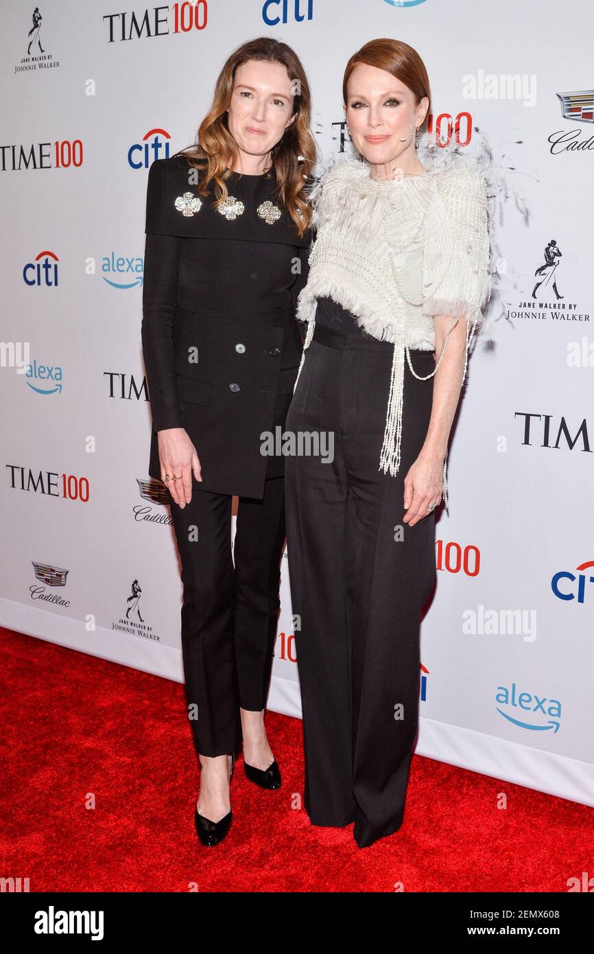 Clare Waight Keller, Julianne Moore walking the red carpet at the 2019 ...