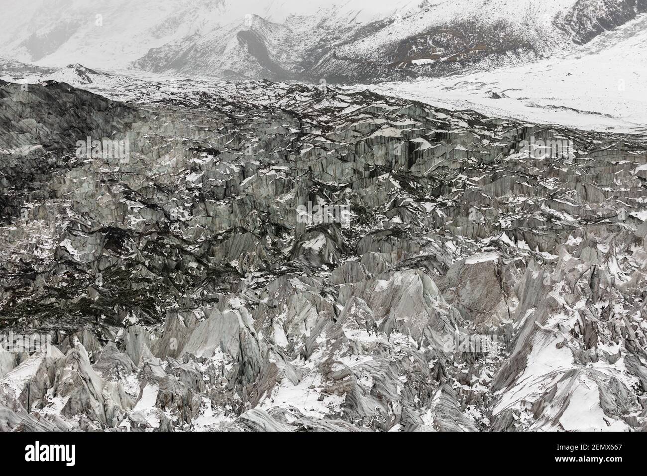 Massive glacier ice field in mountains Stock Photo - Alamy