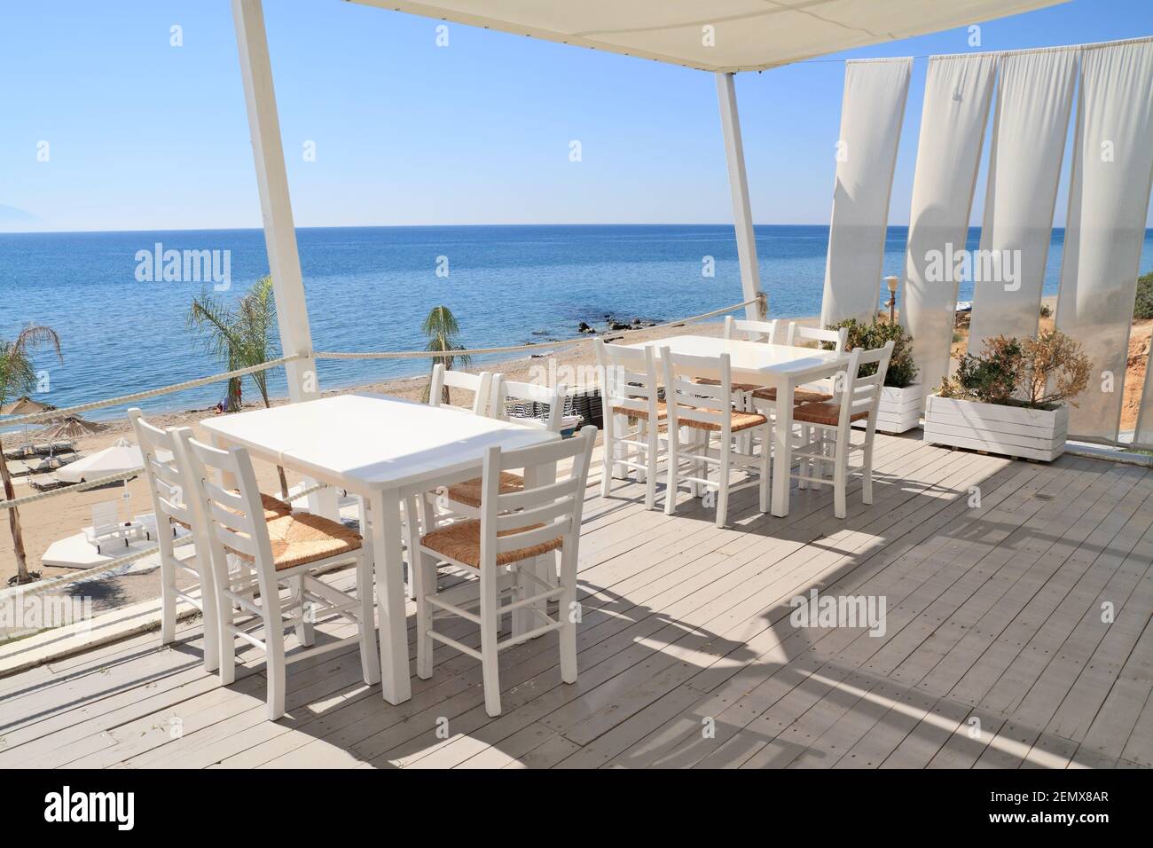 Typical greek tavern - cafe on balcony, by the mediterranean sea Stock ...