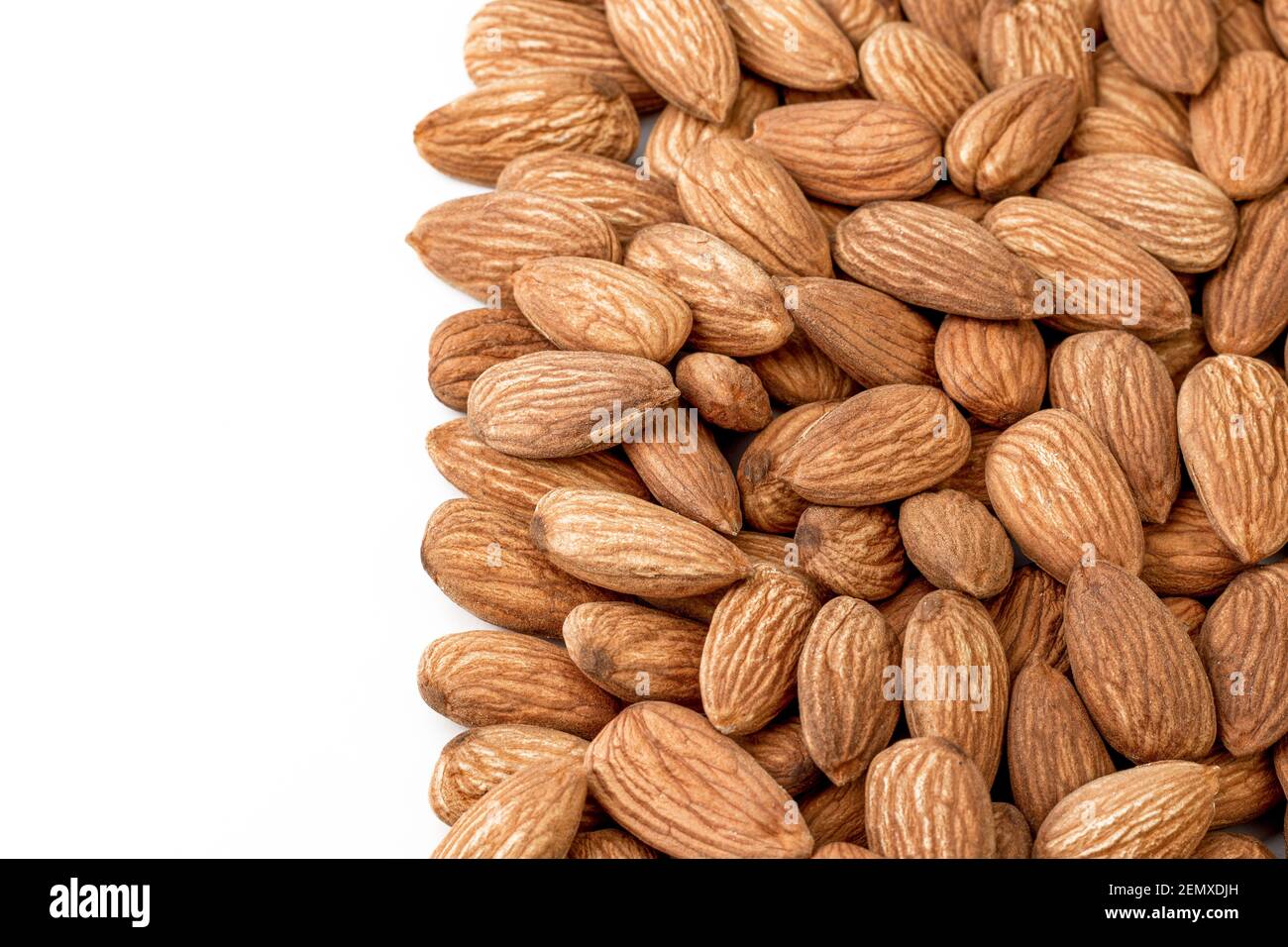 Almonds isolated on white background. Flat lay top view Stock Photo - Alamy