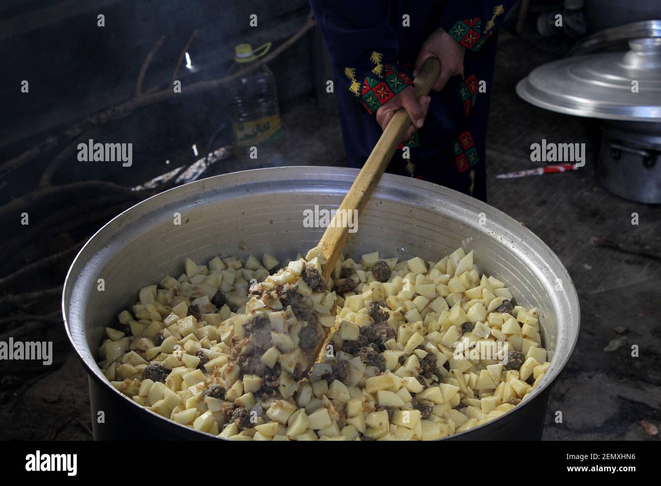 Gaza. 8th Feb, 2021. Palestinian woman Samira Abu Amra cooks food for ...