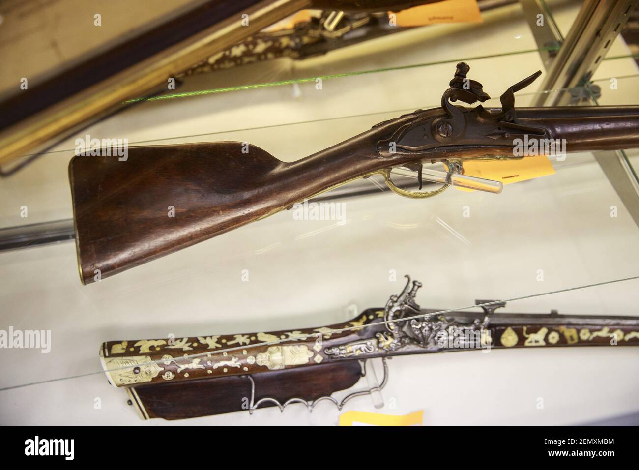 A Dutch Type III musket made between 1750 and 1770, top, which fired ...