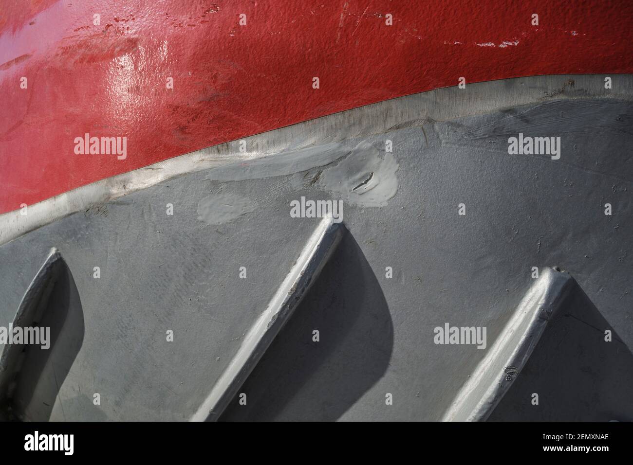 close up of a red boat hull Stock Photo - Alamy