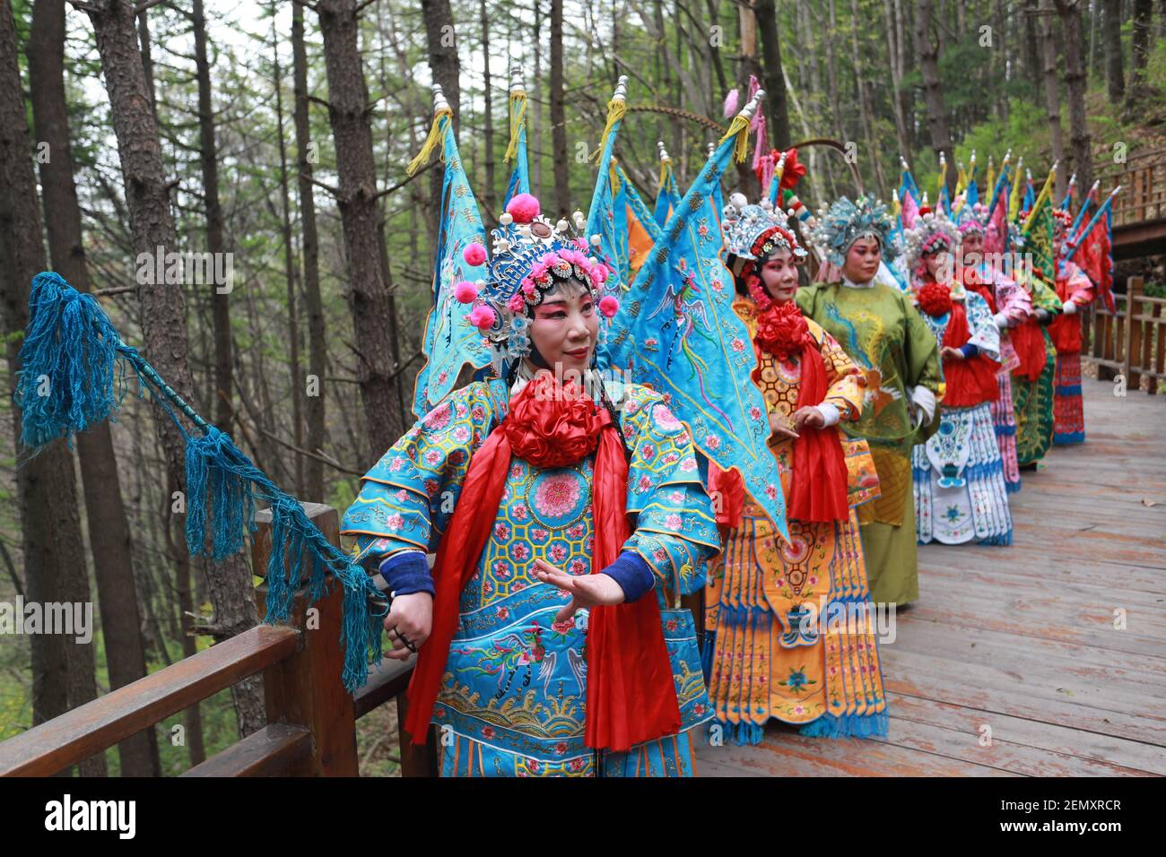 Chinese Yu Opera artists dressed in traditional costumes perform during ...