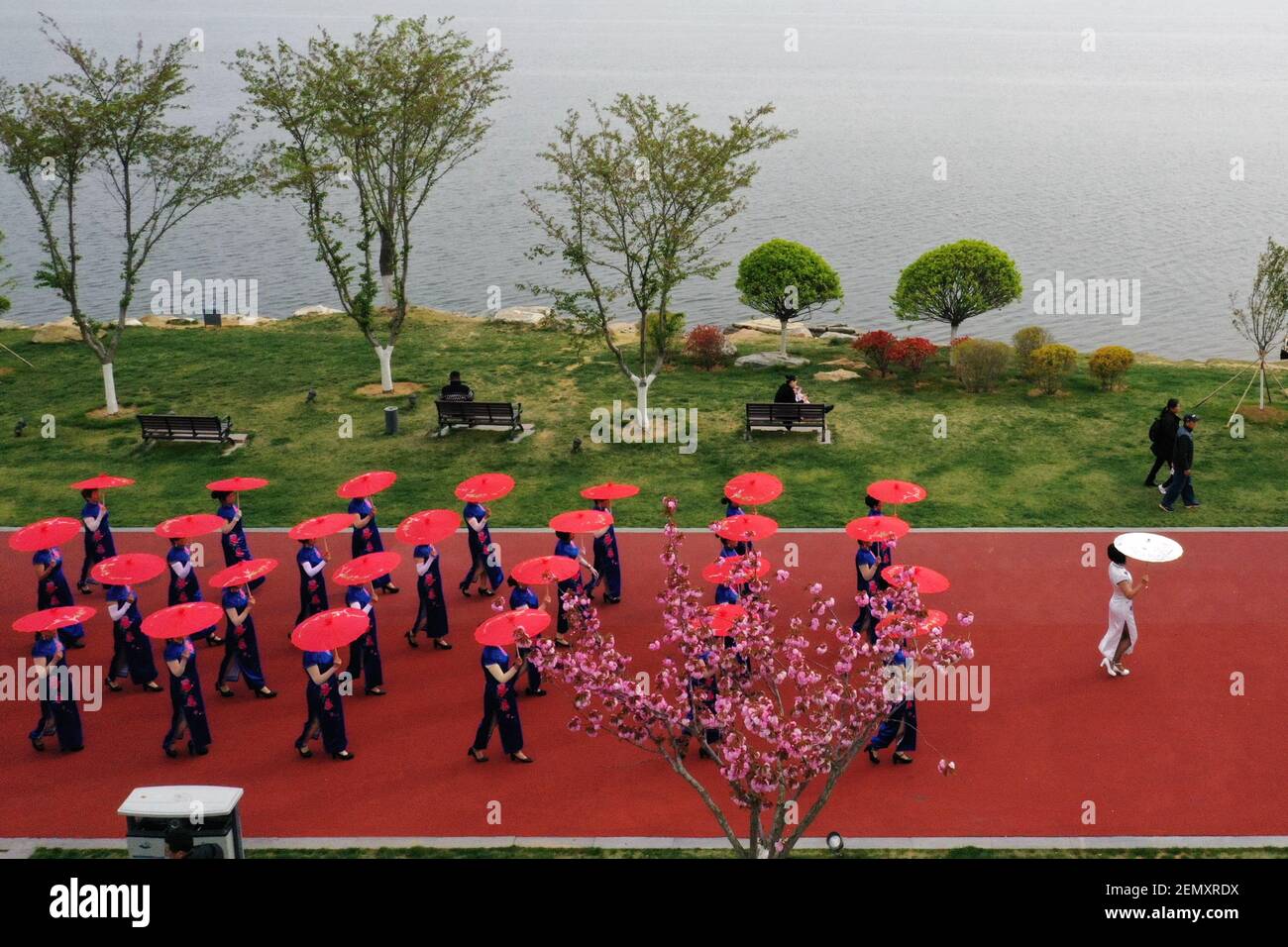 Chinese women dressed in Cheongsam, a traditional Chinese dresses also ...