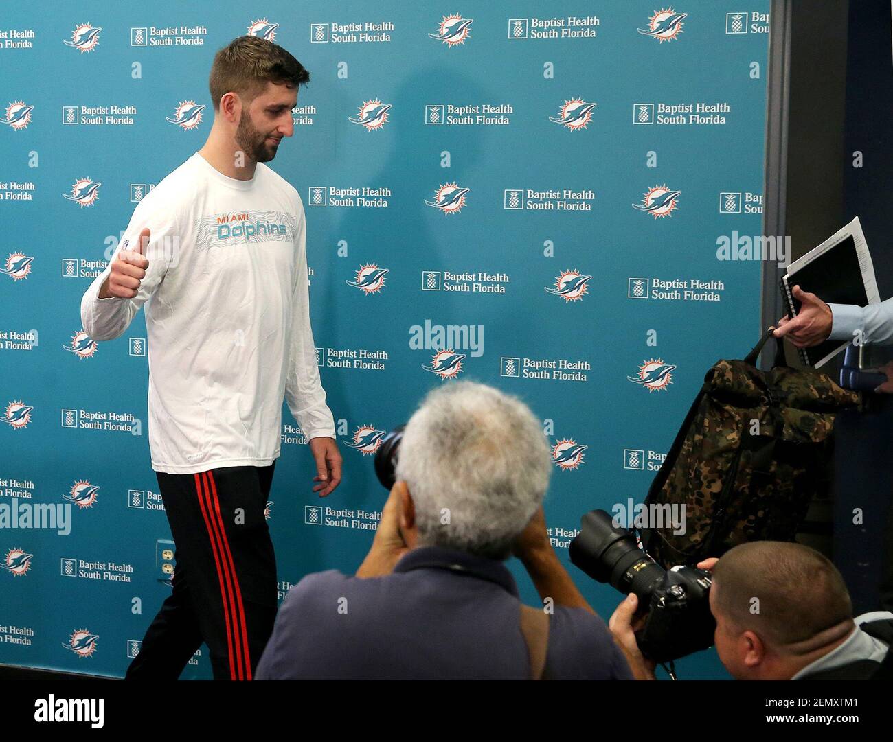 Miami Dolphins quarterback Josh Rosen gives a thumbs up to the media ...