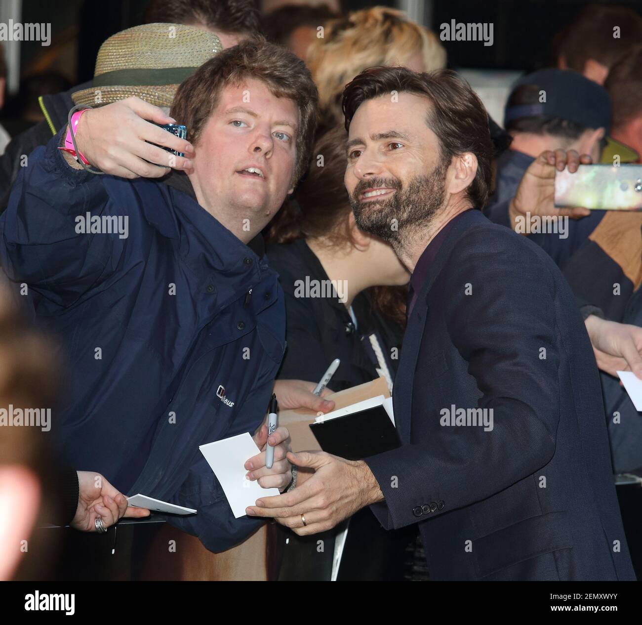 David Tennant (R) take selfie with fan on the red carpet at the Tolkien ...