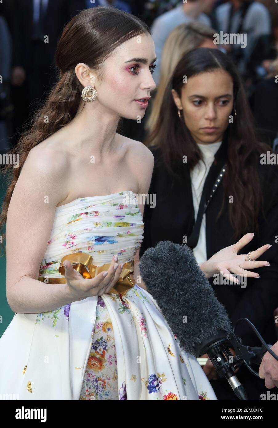 Lily Collins on the red carpet at the Tolkien UK Premiere at the Curzon ...