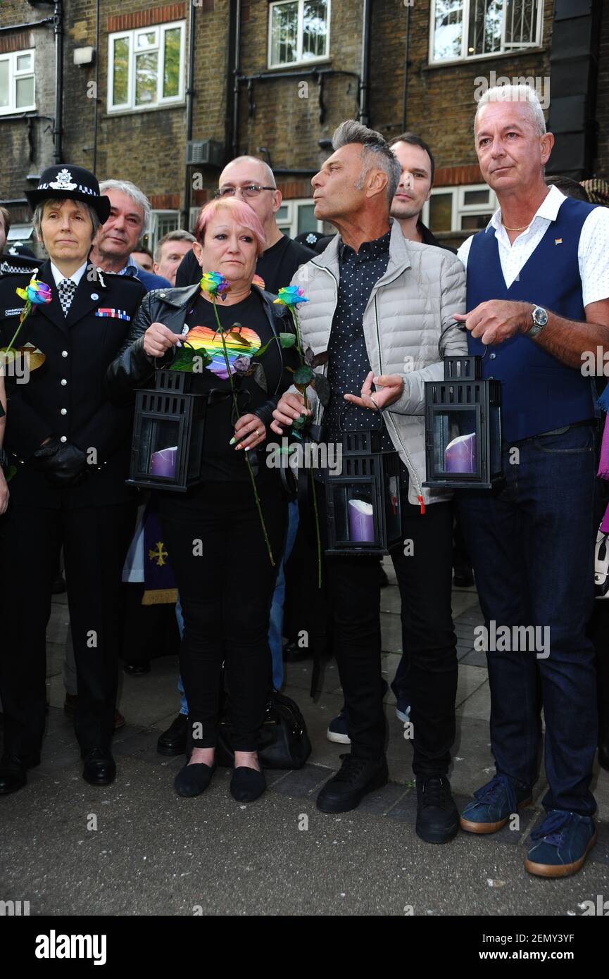 Cressida Rose Dick CBE and the family members of the victims are seen ...