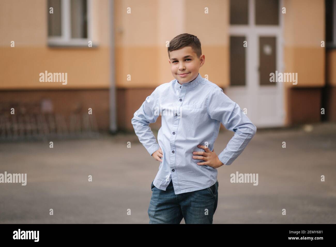 Happy schoolboy in front of school. Cute boy finish school year Stock ...
