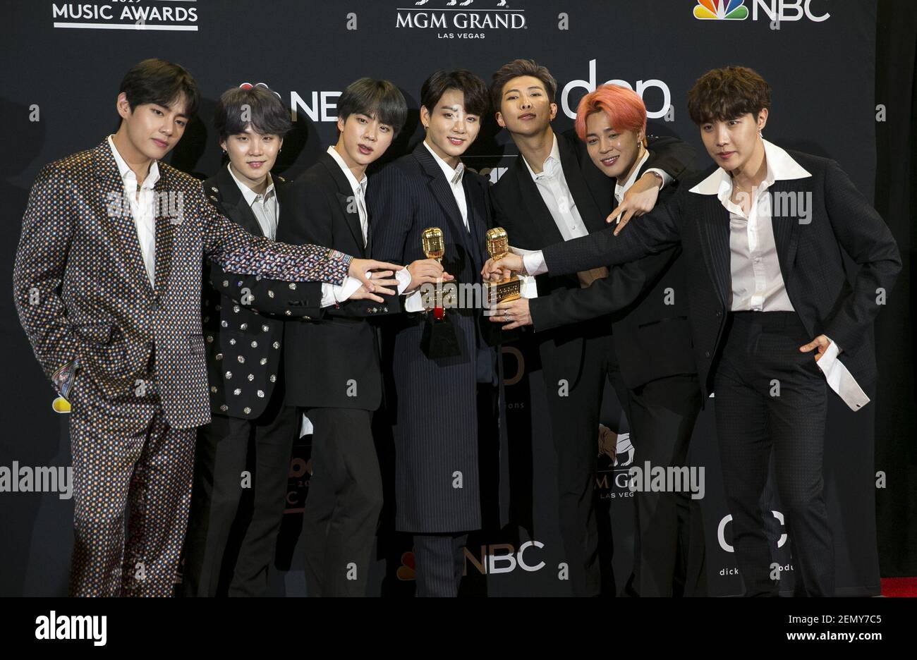 South Korean boy band BTS poses in the press room with their awards at ...