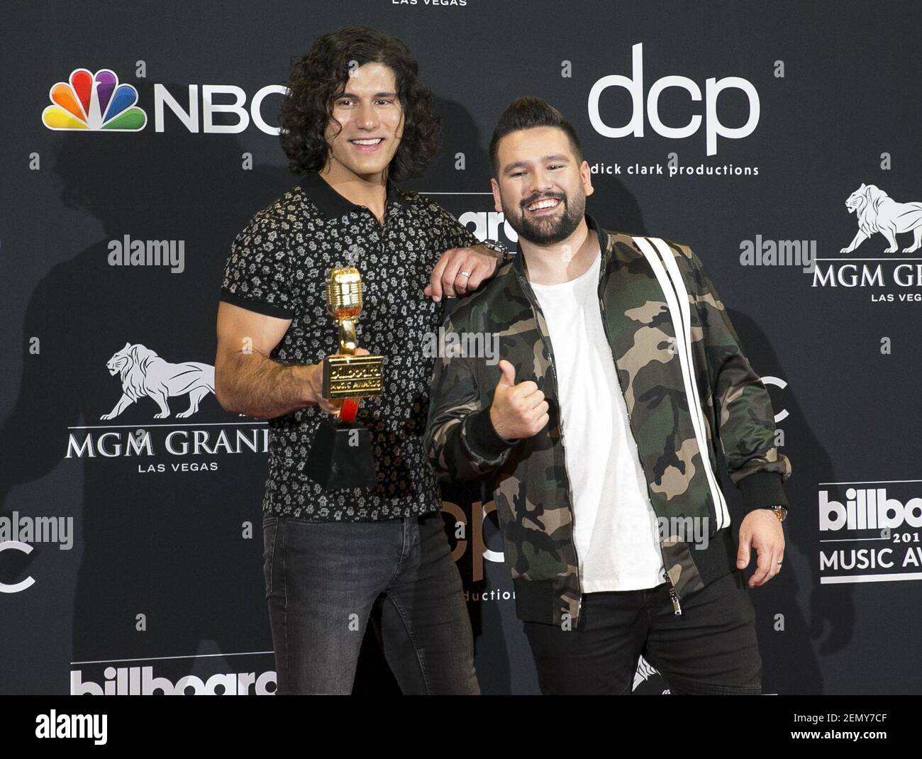Dan Smyers and Shay Mooney of Dan + Shay pose with their award at the ...