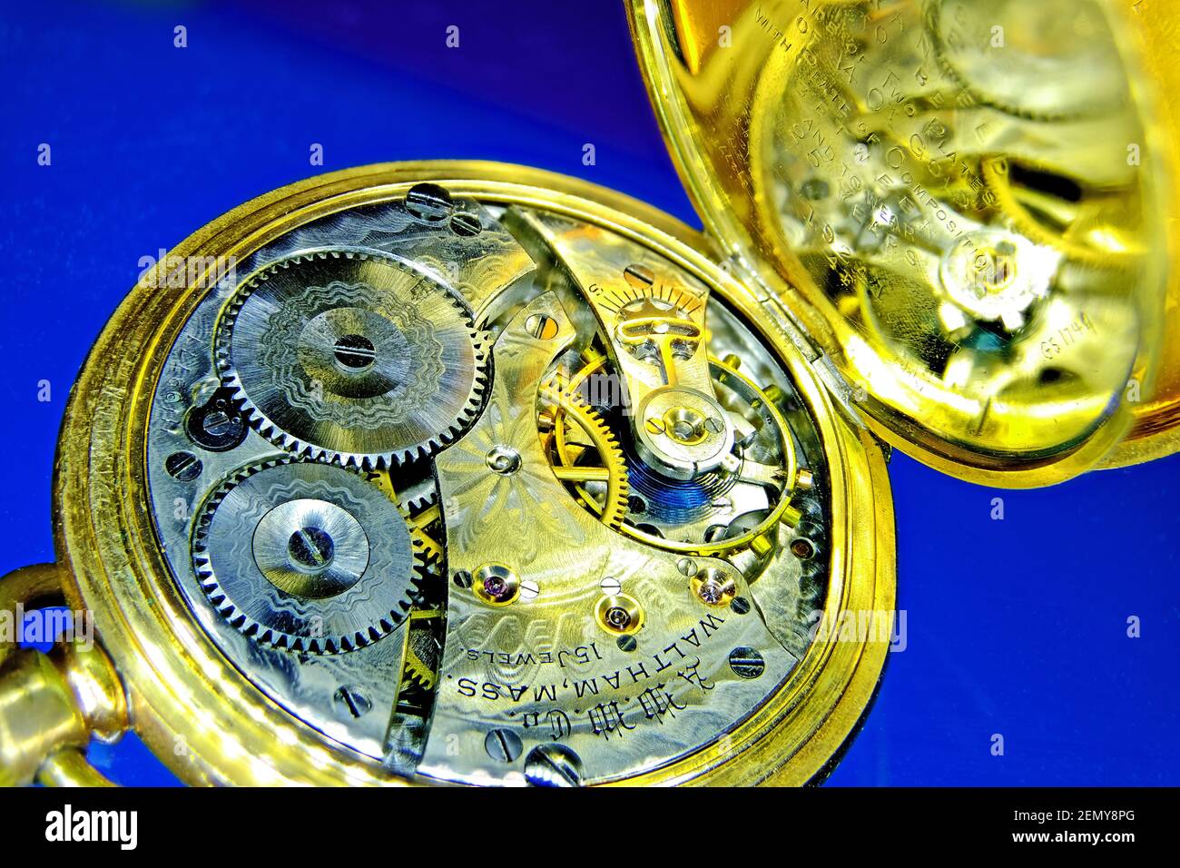 17 jewel vintage pocket watch exposing working cogs wheels and parts ...
