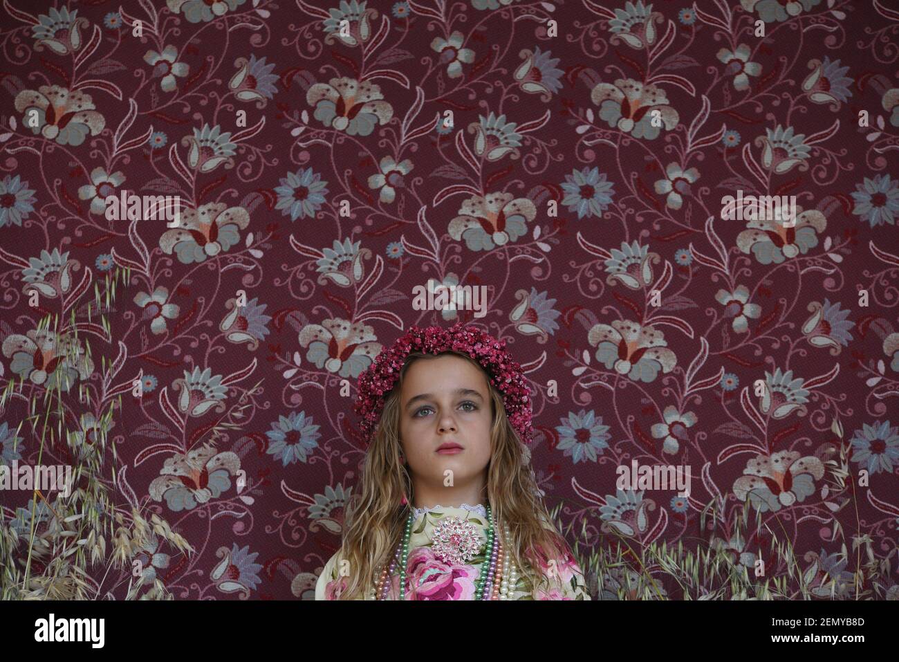 A Maya girl is seen seated in an altar during the traditional ...