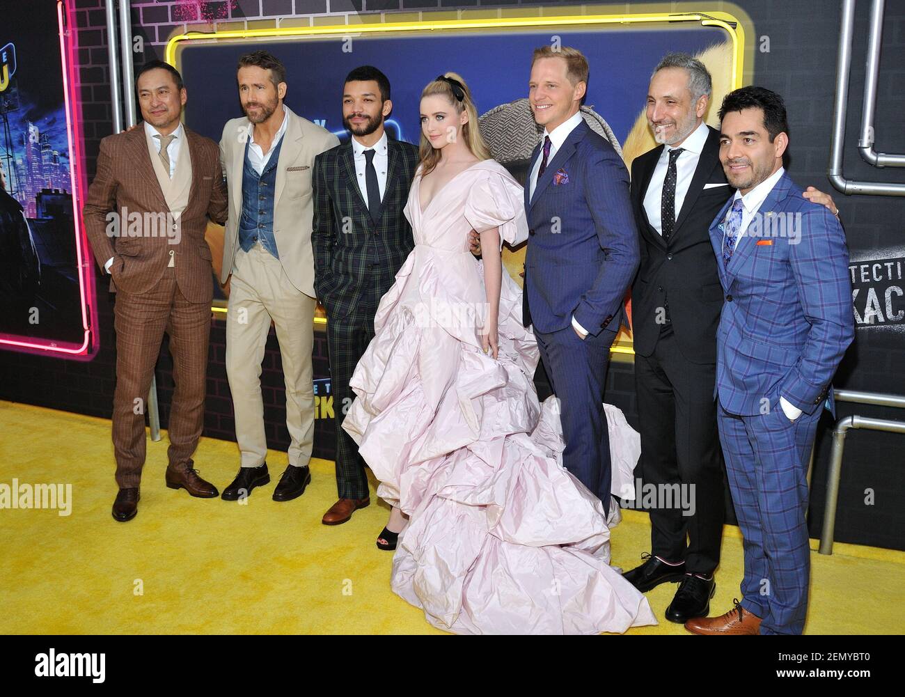 The cast of Pokemon Detective Pikachu, L-R: Ken Watanabe, Ryan Reynolds ...