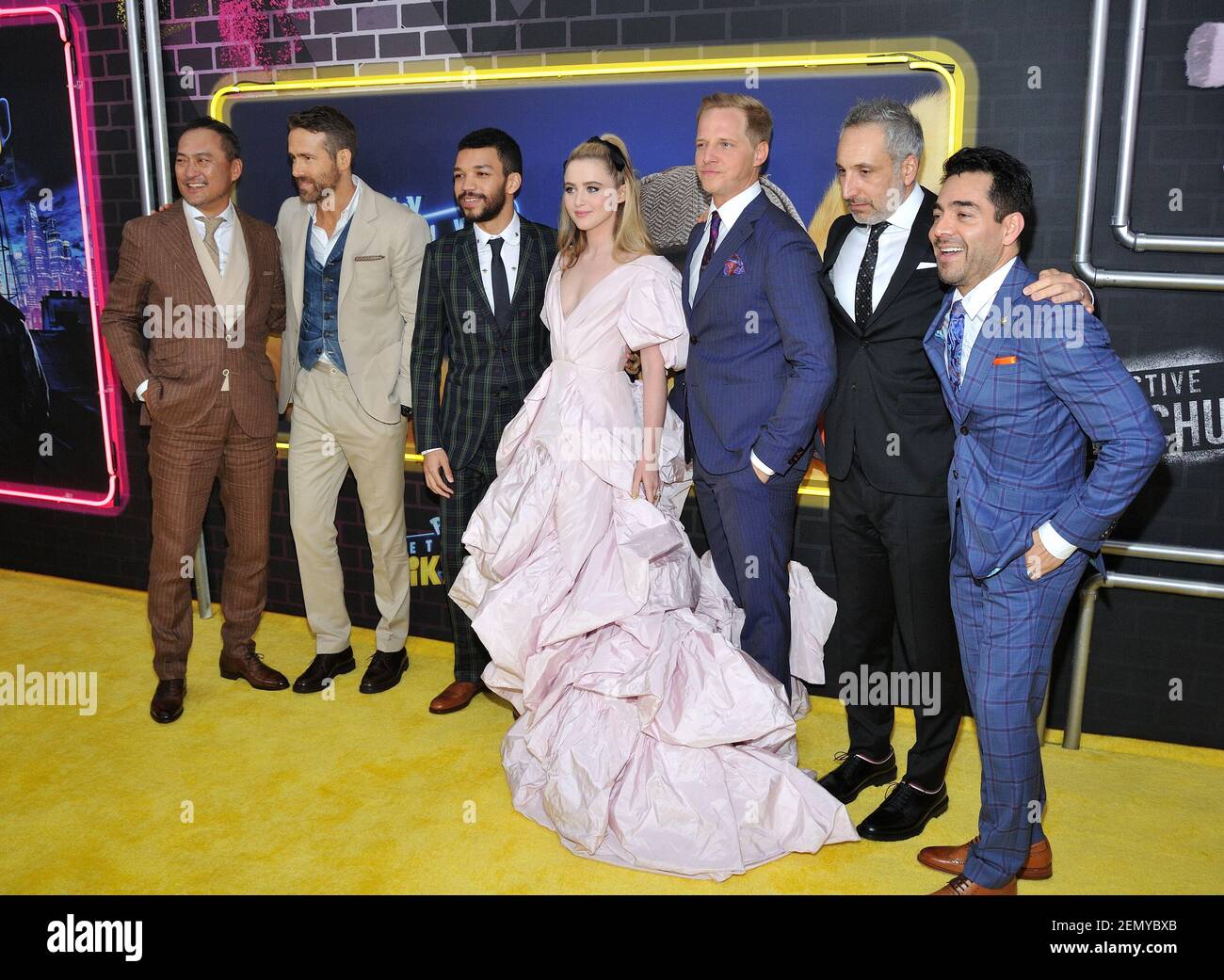 The cast of Pokemon Detective Pikachu, L-R: Ken Watanabe, Ryan Reynolds ...