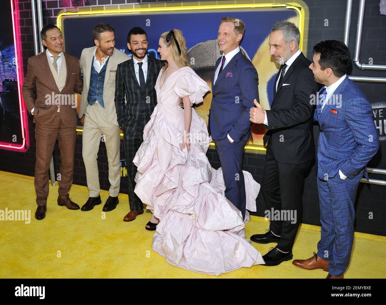 The cast of Pokemon Detective Pikachu, L-R: Ken Watanabe, Ryan Reynolds ...