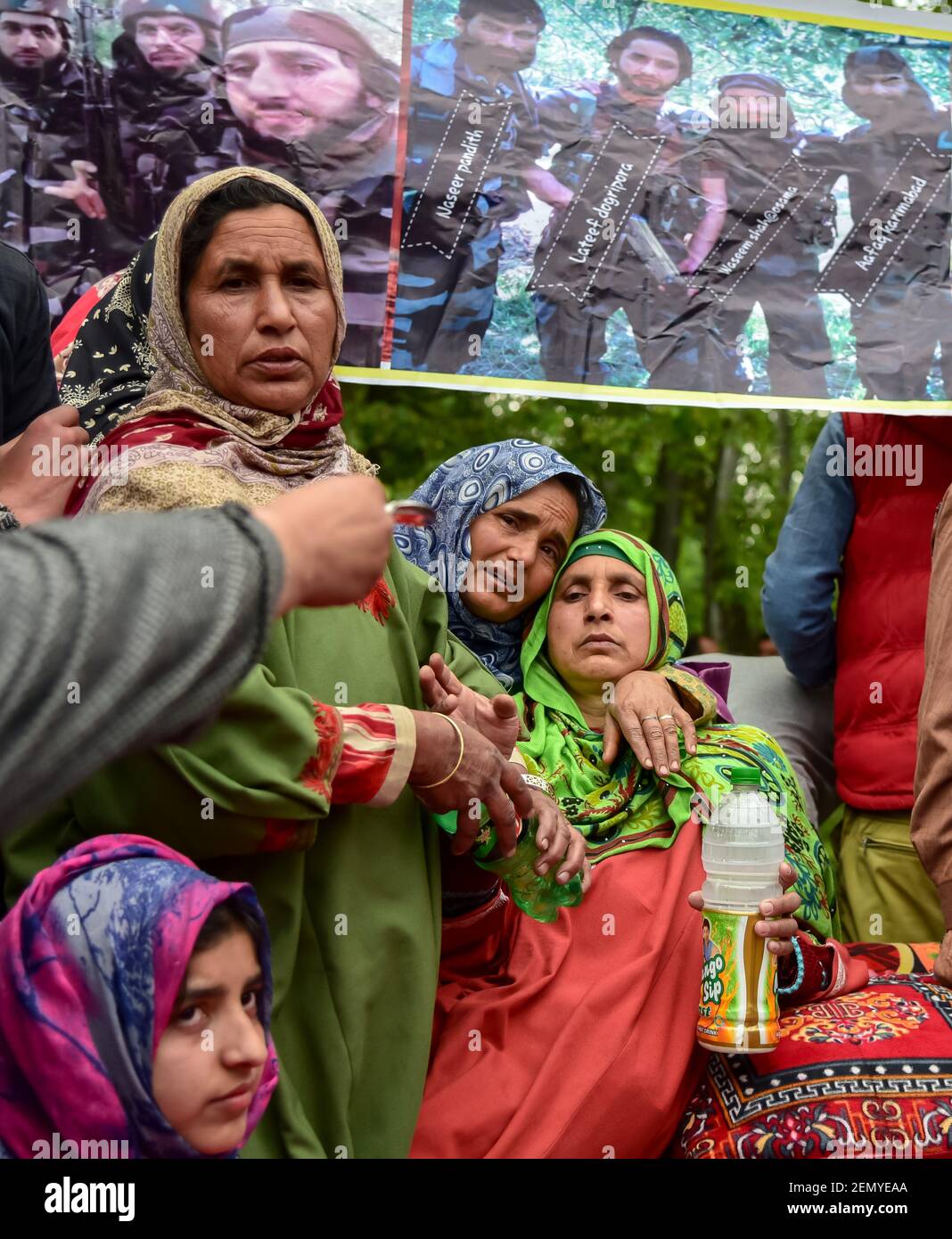 Mother (Right) of Lateef Tiger seen grieving during the funeral ...