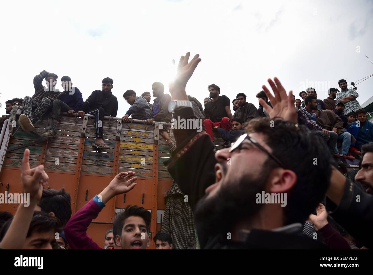 Kashmiri villagers seen shouting pro-freedom slogans during the funeral ...
