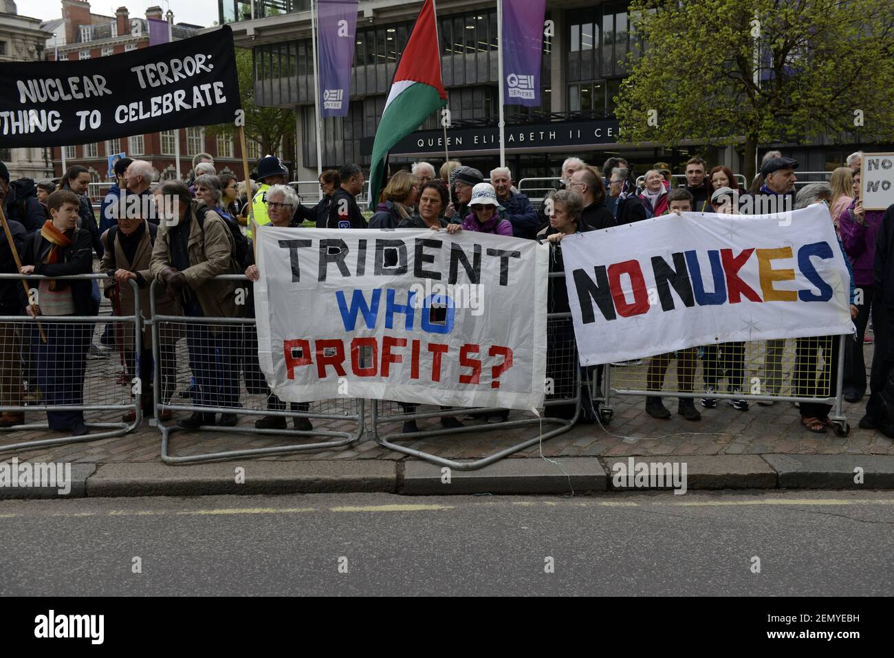 A crowd of anti-nuclear activists seen with banners during the protest ...